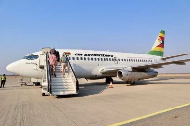 WATCH: Zim plane catches fire over OR Tambo Airport | The Citizen