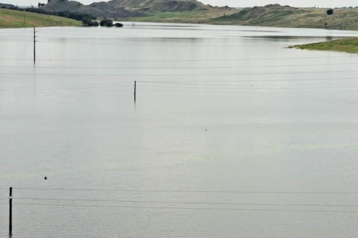 PHOTO: Hendrina outage – Eskom power lines submerged in dam