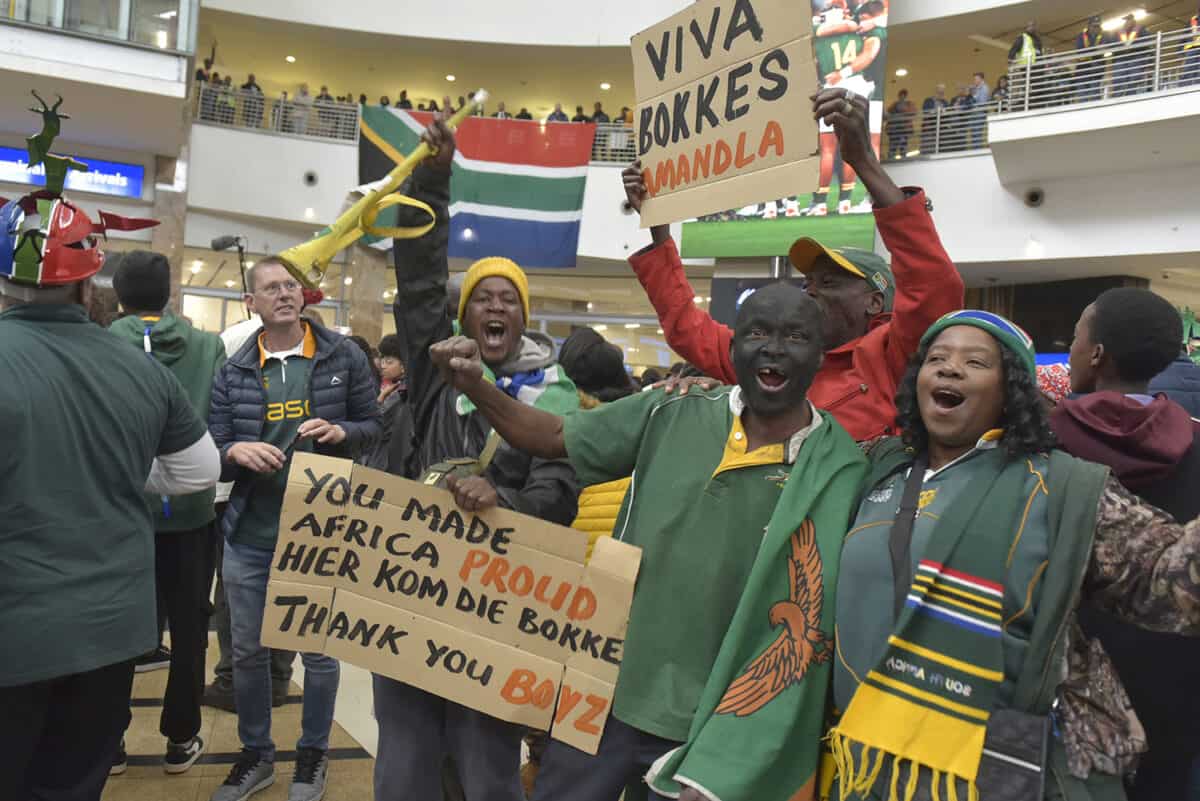 In pictures: The victorious Springboks arrive back in SA to a rousing ...