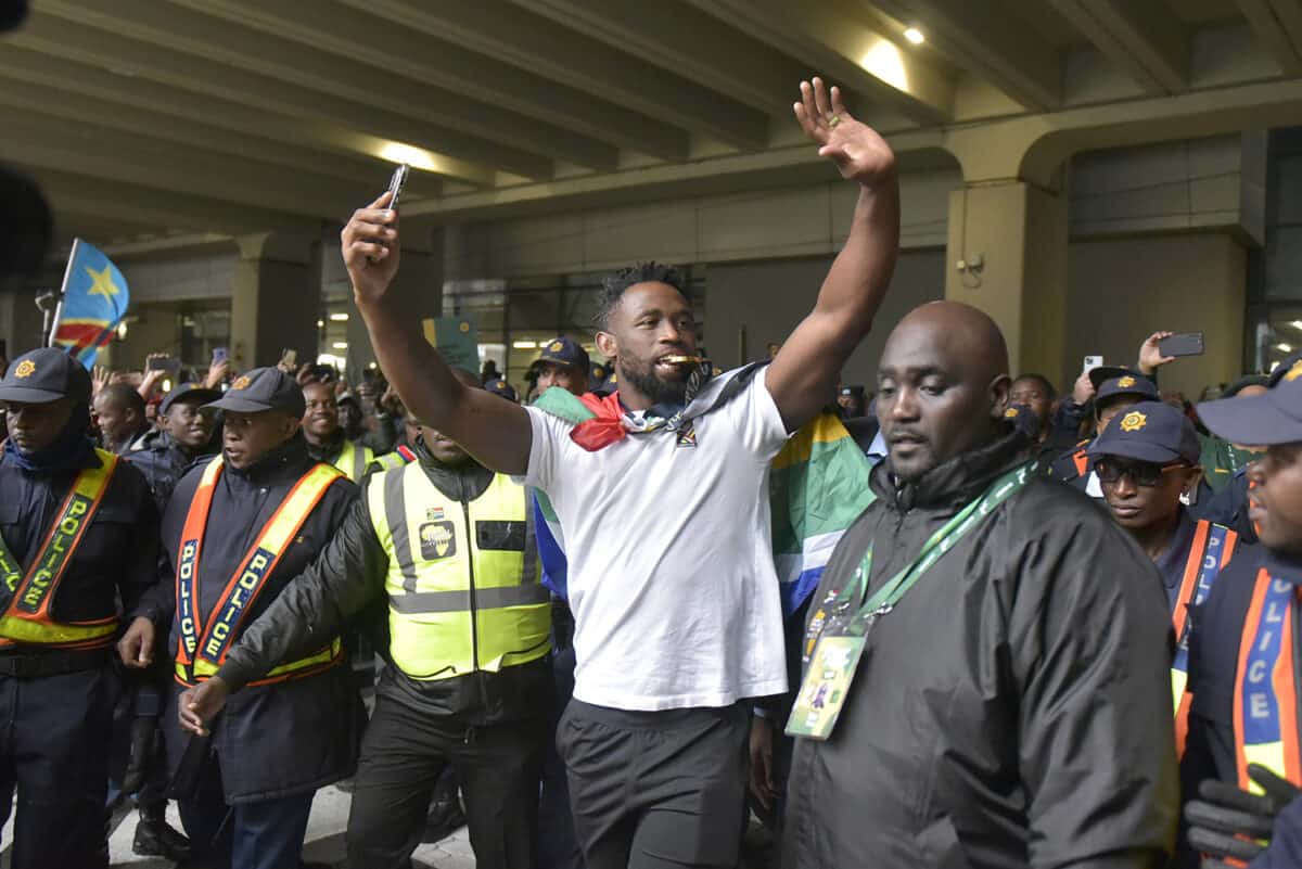 In pictures: The victorious Springboks arrive back in SA to a rousing ...