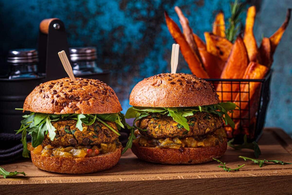 Chickpea burger with coconut onion rings and garlic & herb yoghurt sauce