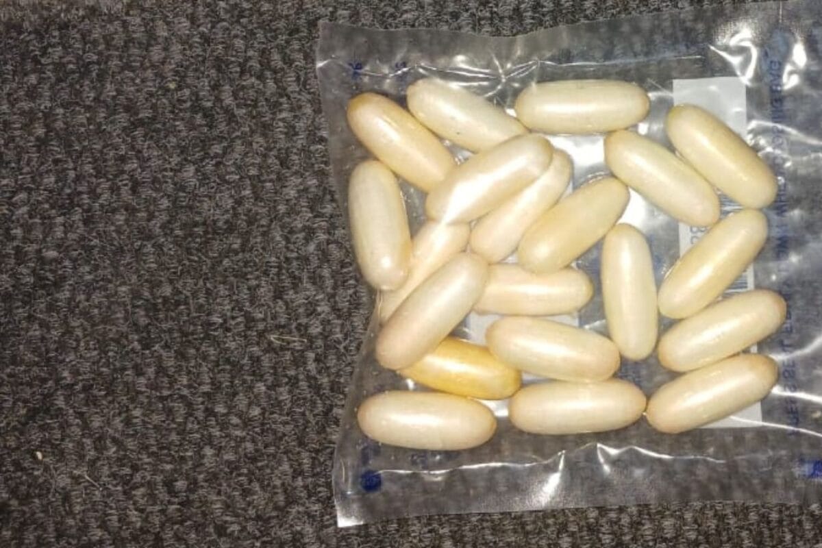 Brazilian drug trafficker releasing bullets of cocaine after arrest